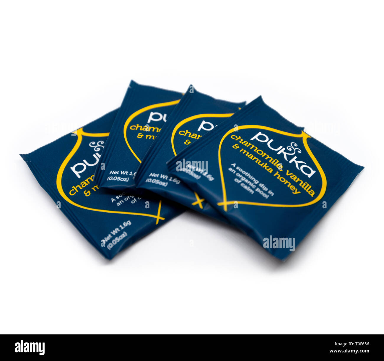 Packets of Pukka tea are displayed on a white background Stock Photo ...