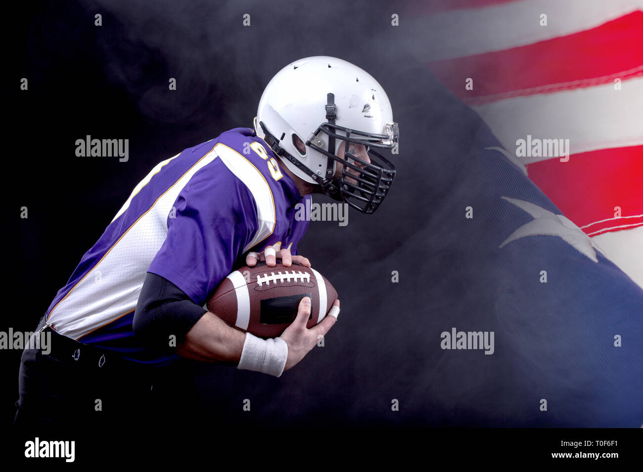 American Footballer running fast Stock Photo - Alamy