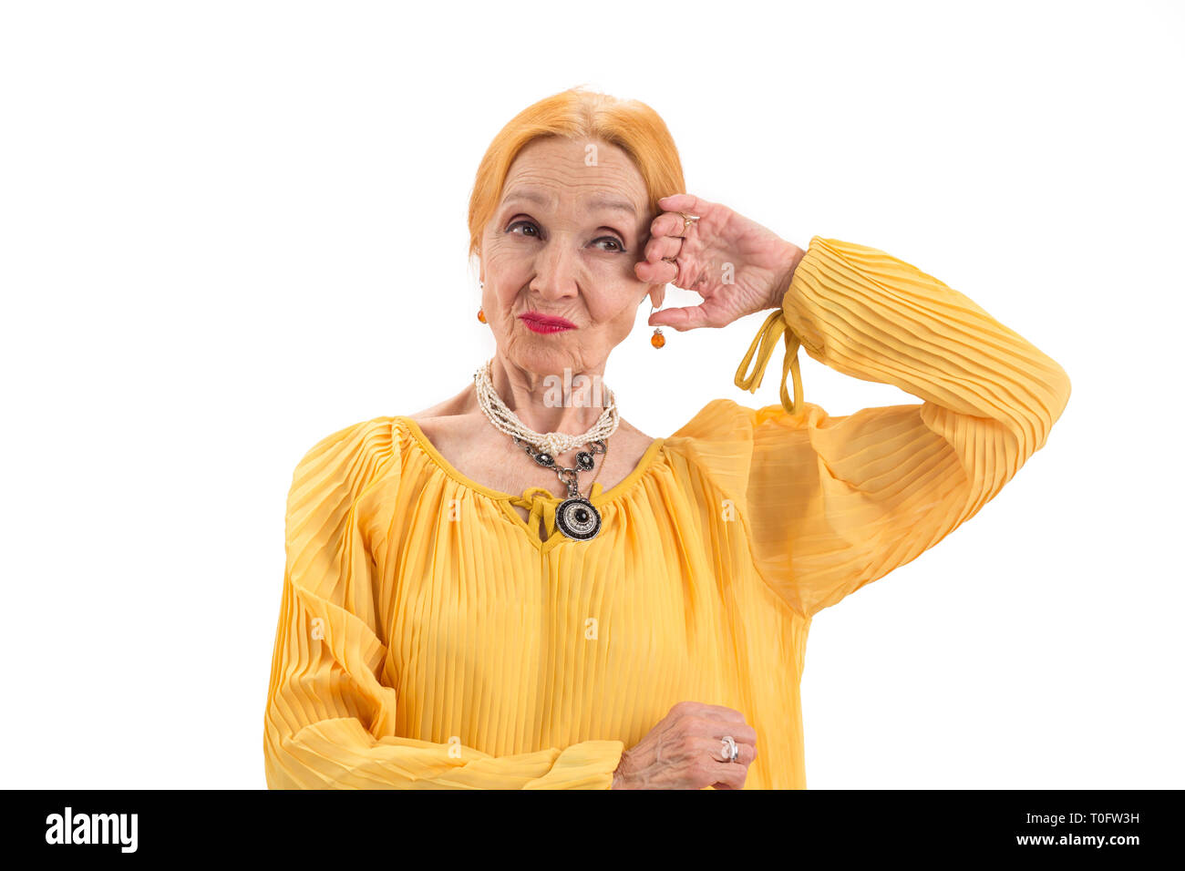 Woman with suspicious face. Old lady looking aside isolated. Know your ...