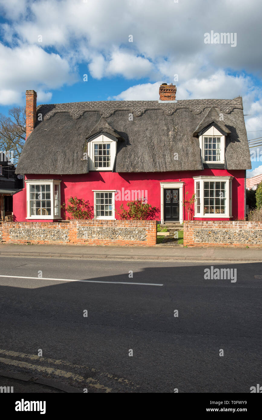 Pictureque red thatched cottage at Cavendish village in Suffolk, East ...