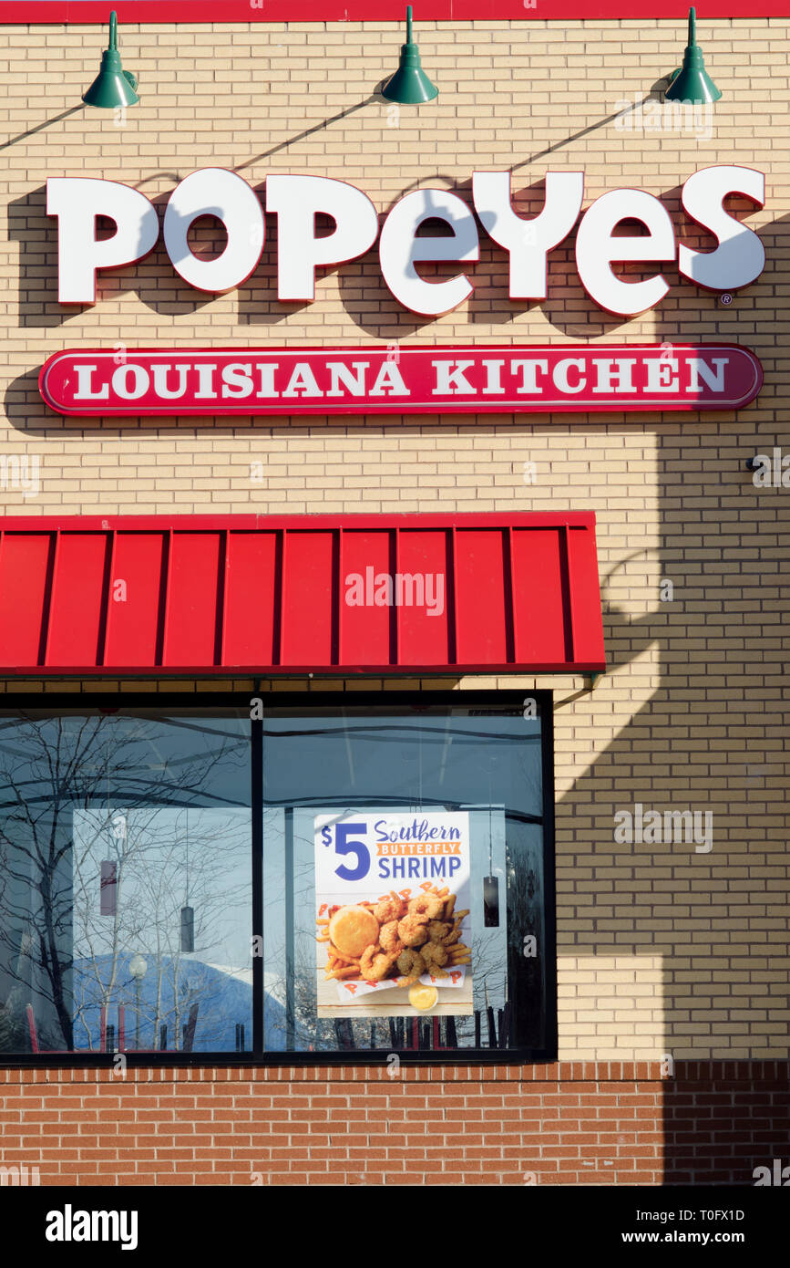 Exterior of Popeyes Louisiana Kitchen restaurant with sign in New ...
