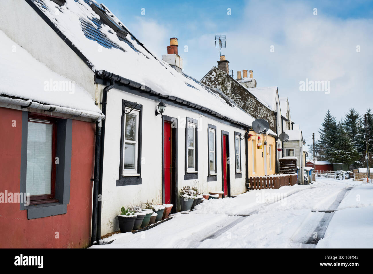 Row of scottish cottages. Leadhills village in the early morning snow ...