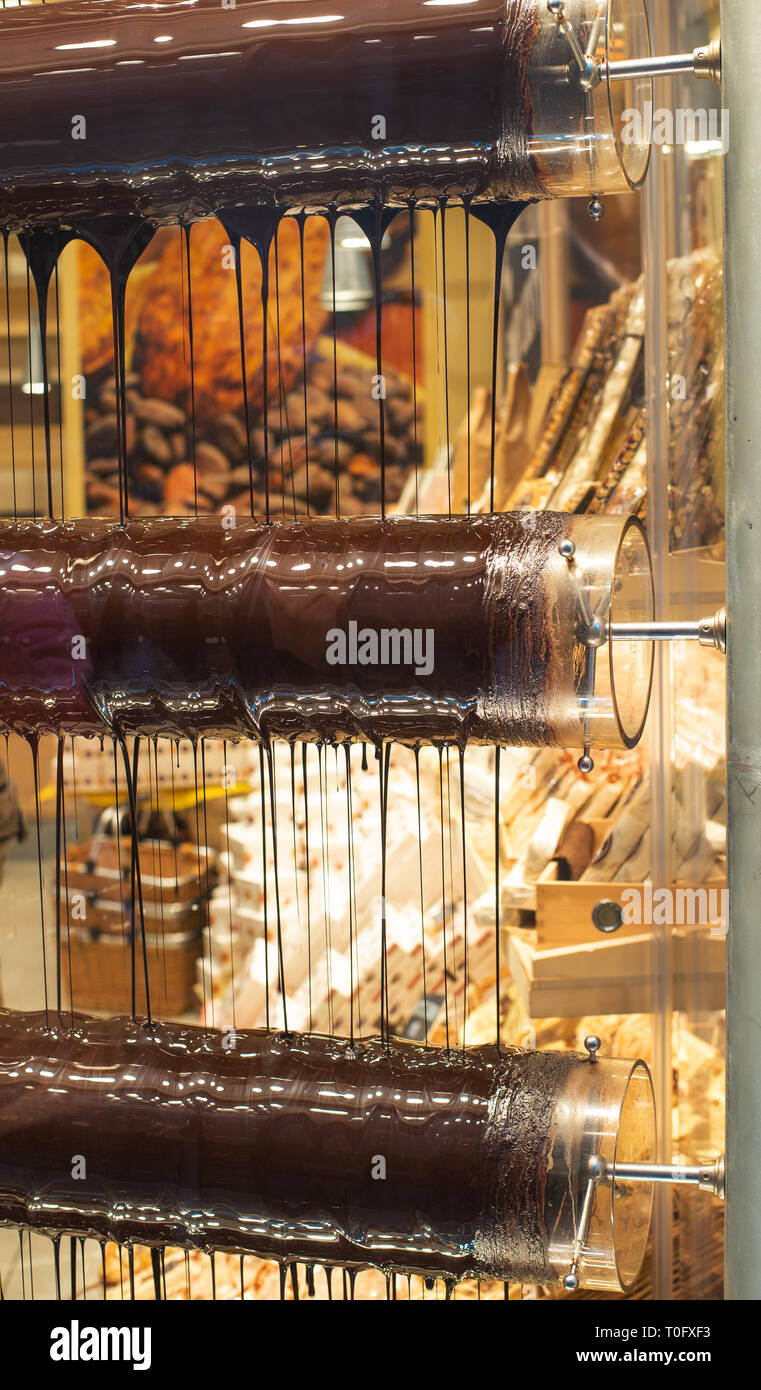 Showcase with flowing chocolate Stock Photo - Alamy