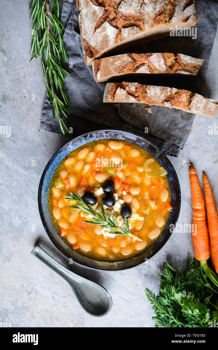 Fasolatha – delicious Greek white bean soup sprinkled with feta cheese ...