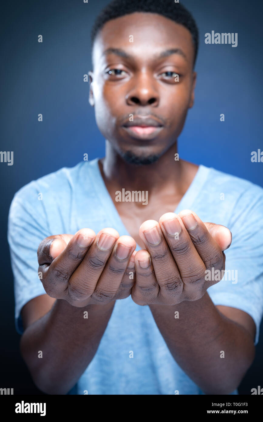 portraits of a young black man with hands, expressions Stock Photo - Alamy