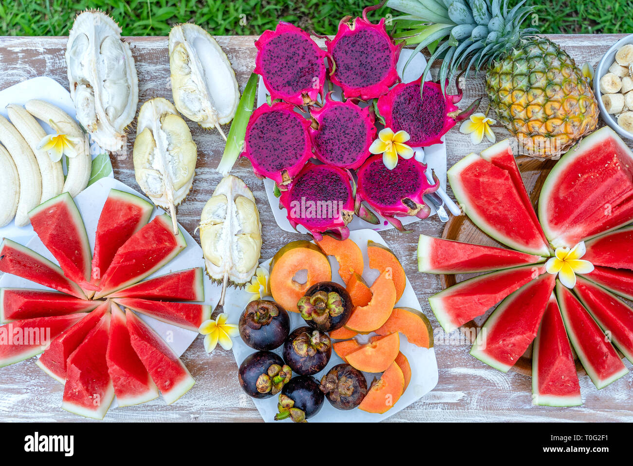 Tropical fruits assortment, close up, top view. Many colorful ripe ...