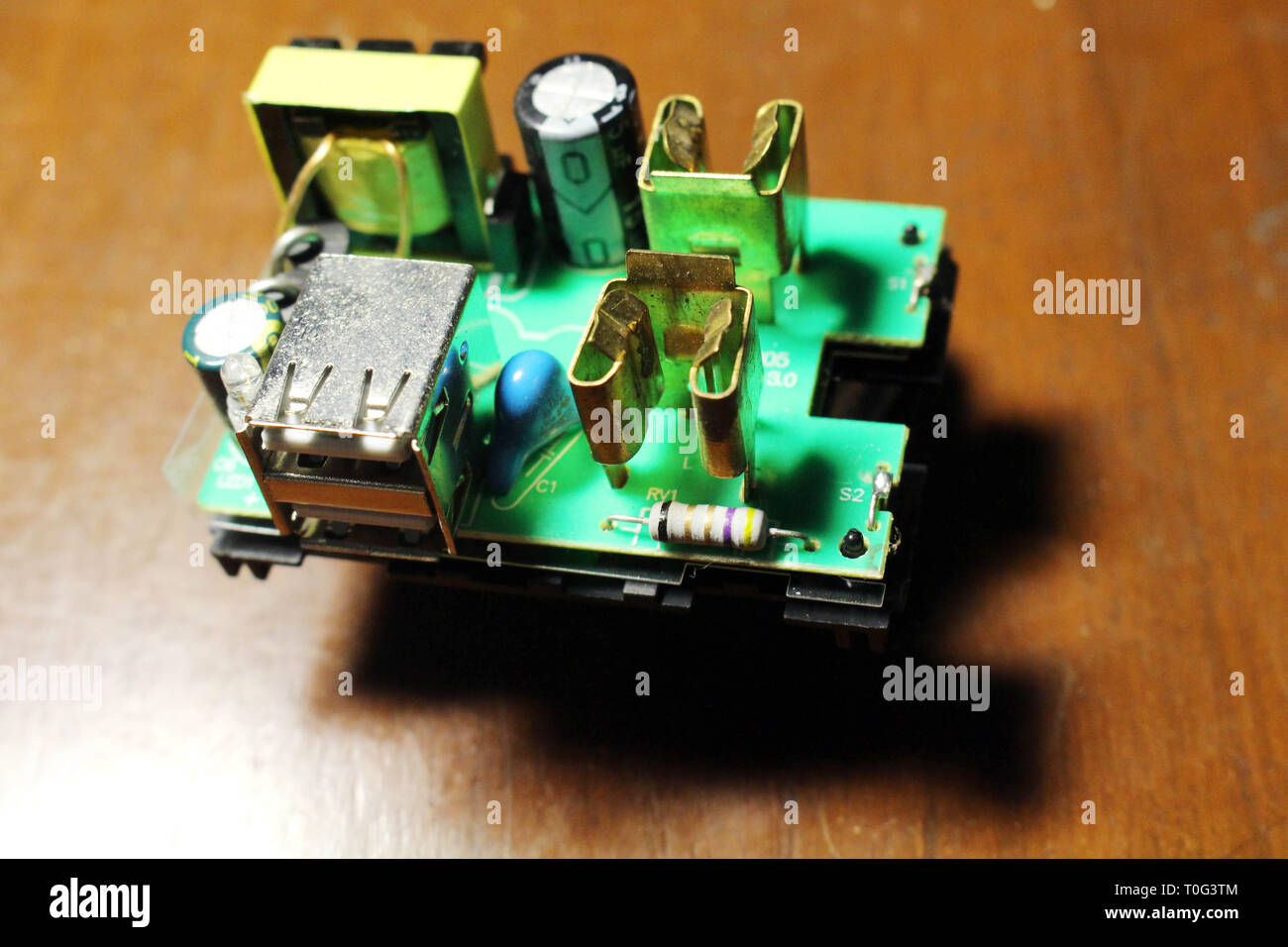 Closeup view at a universal adapter device and its components including ...