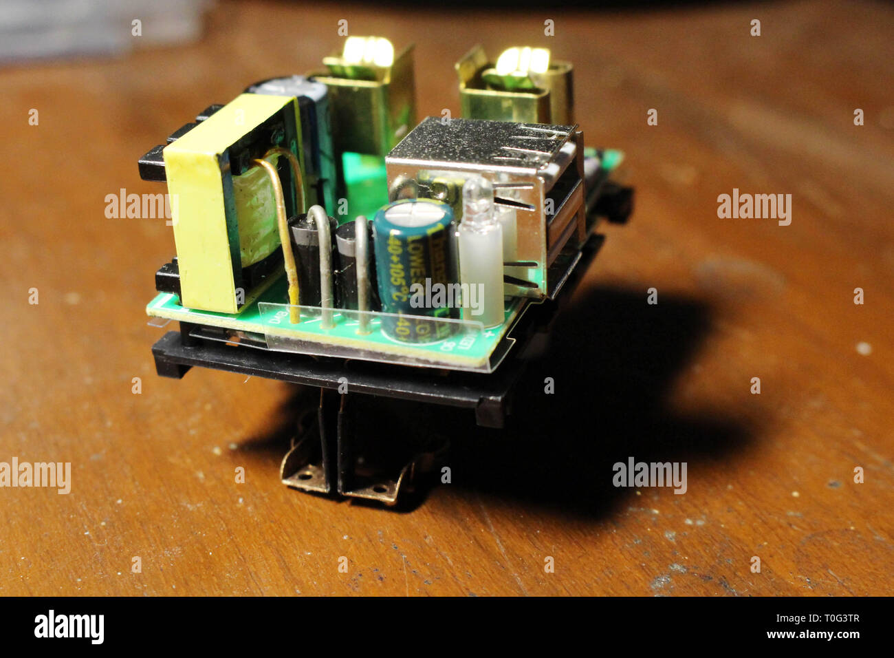 Closeup view at a universal adapter device and its components including ...