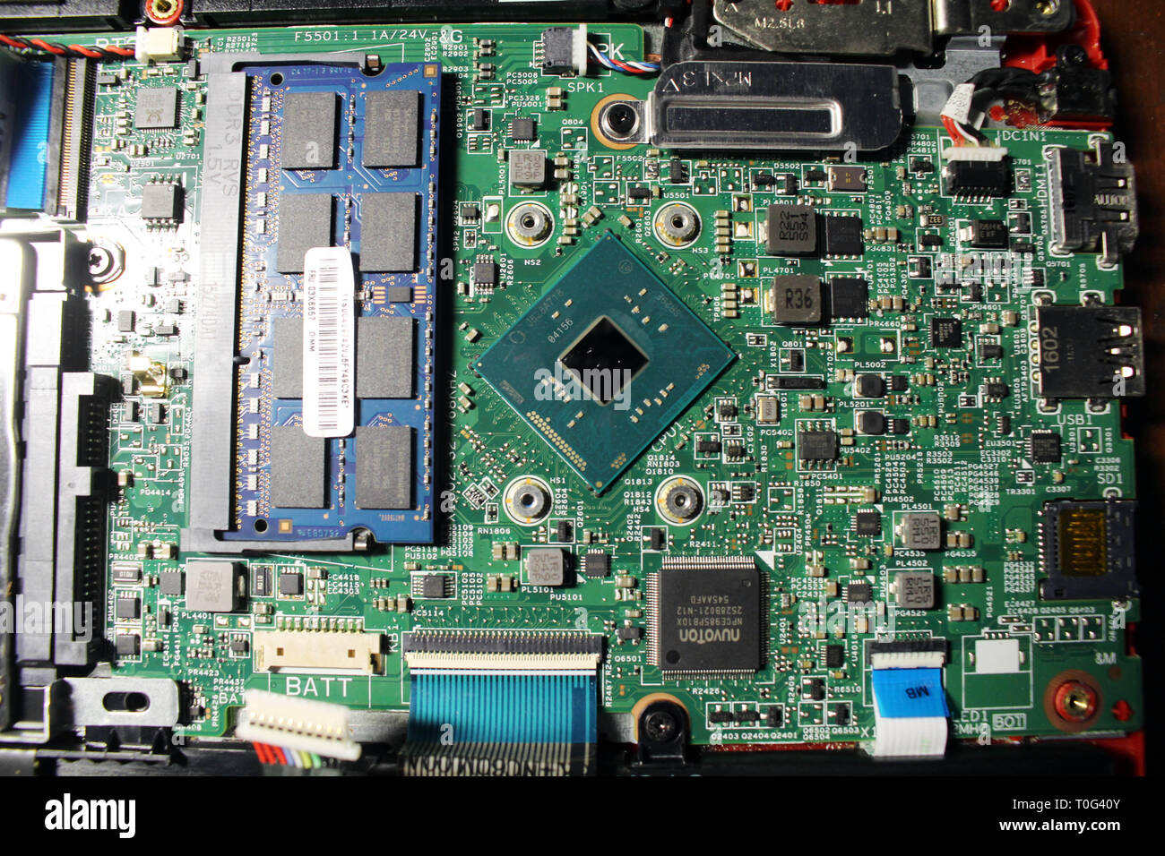 Closeup view at laptop motherboard and components. Processor and memory ...