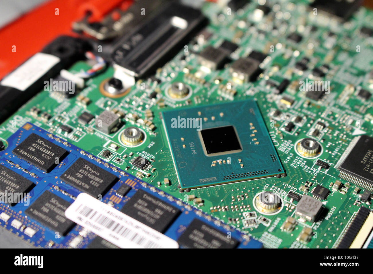 Closeup view at laptop motherboard and components. Processor and memory ...