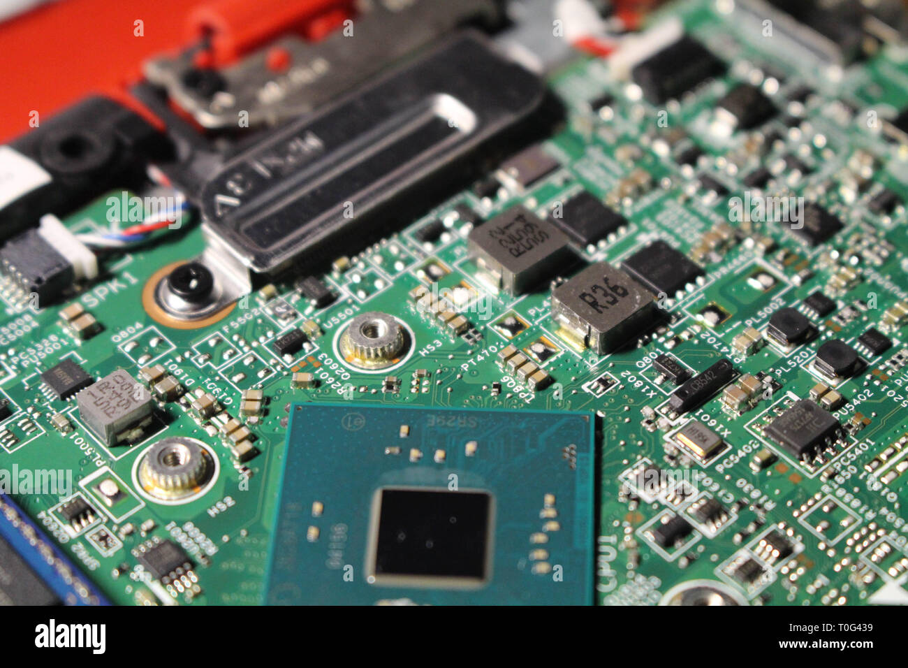 Closeup view at laptop motherboard and components. Processor or CPU as ...