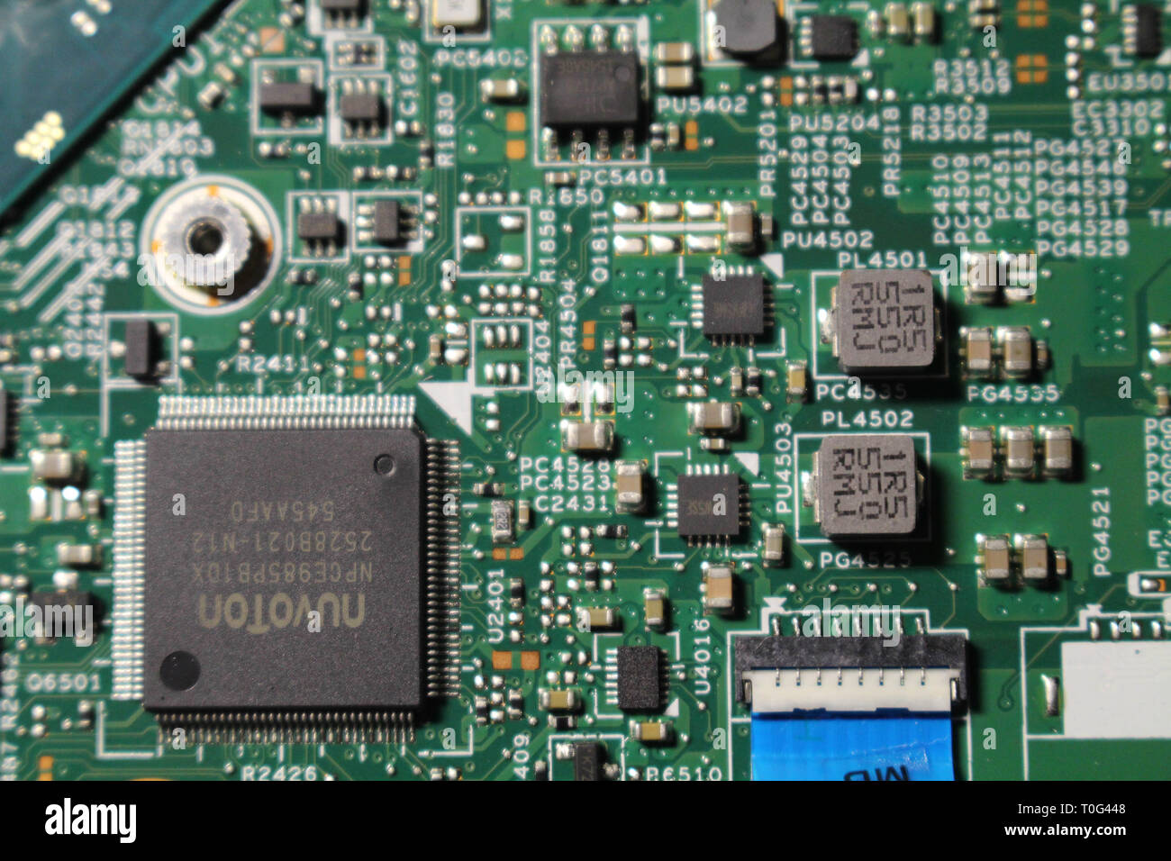 Closeup view at laptop motherboard and semiconductors components. Look ...