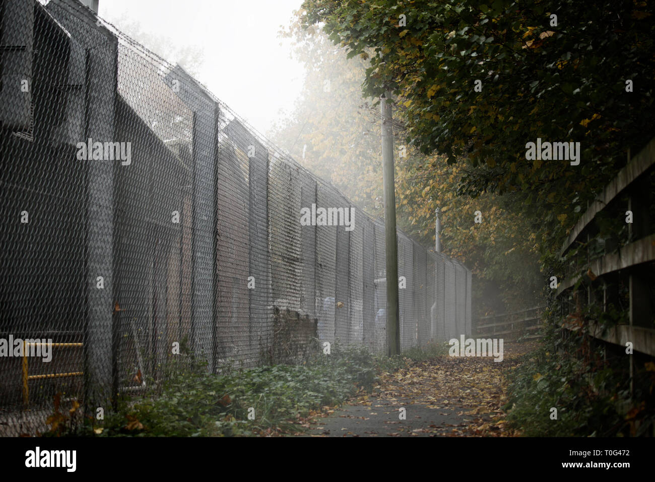 A factory fence boundary line Stock Photo - Alamy