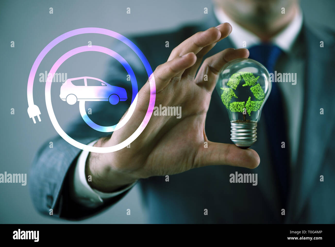 Electric vehicle concept with lightbulb Stock Photo - Alamy