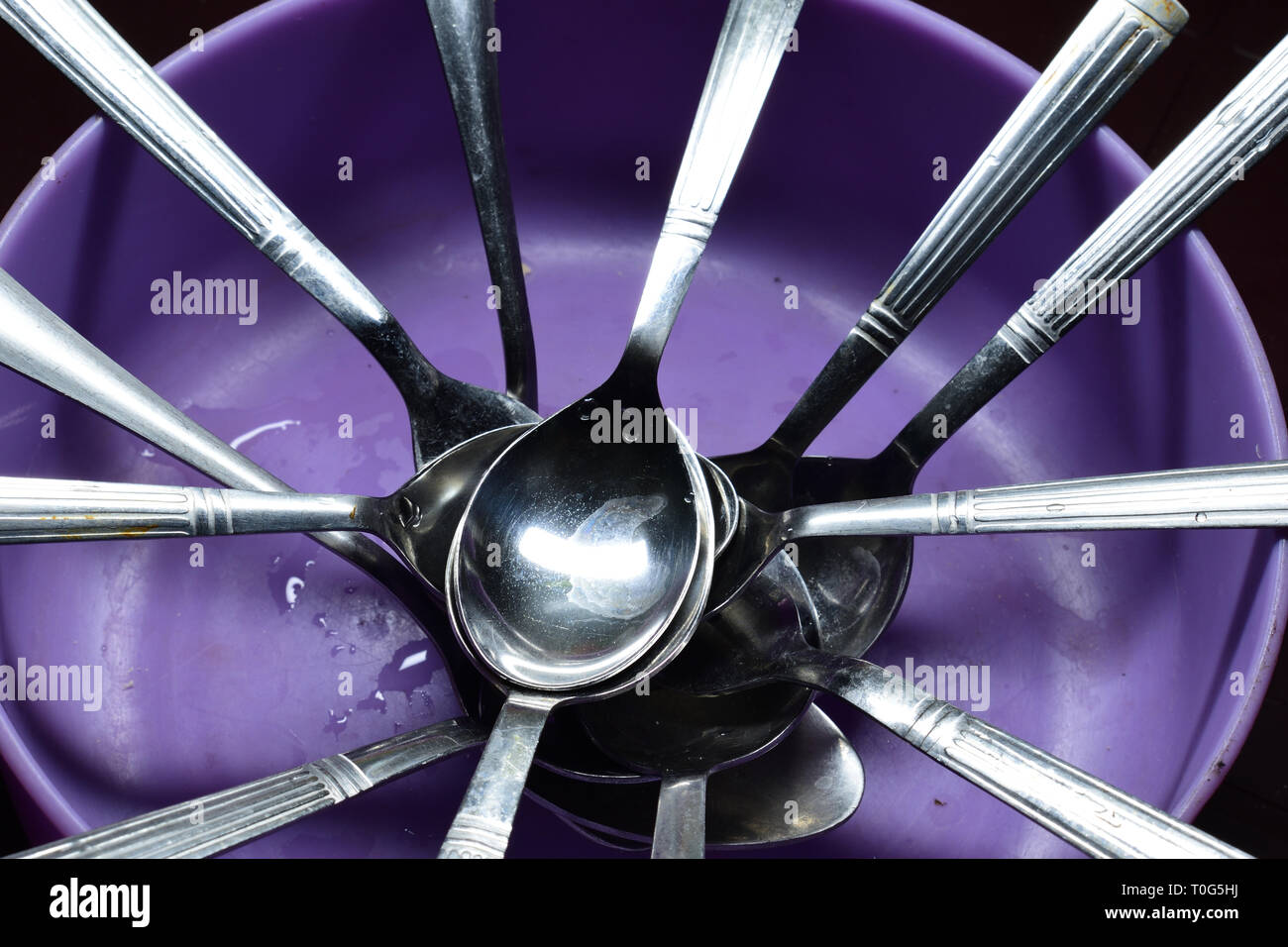 Stack of spoons hi-res stock photography and images - Alamy