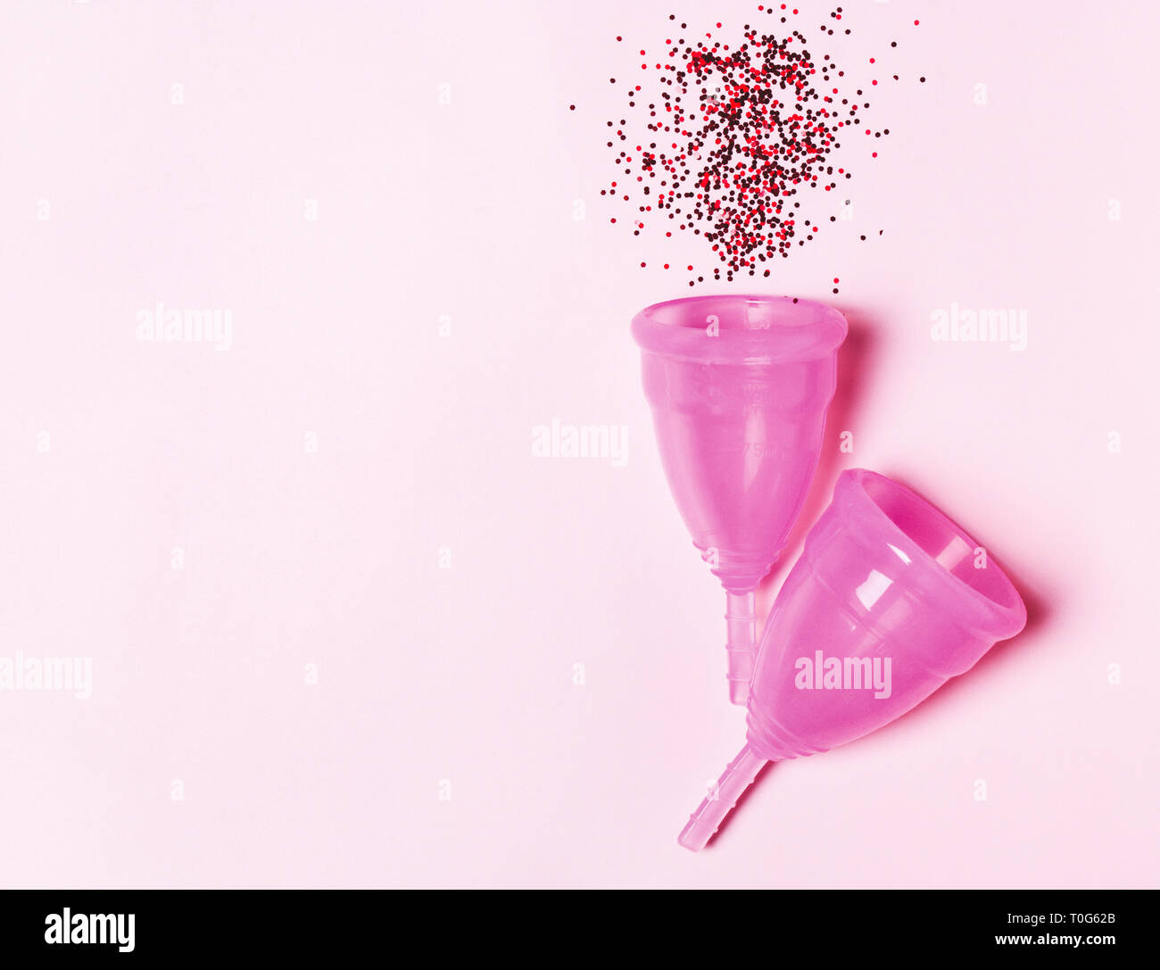 Pink menstrual cup . Concept of women's health, hygienic means of ...
