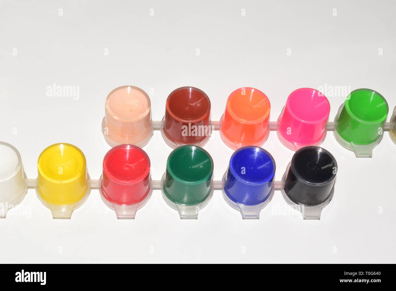 Colorful painting color tin on white background Stock Photo - Alamy