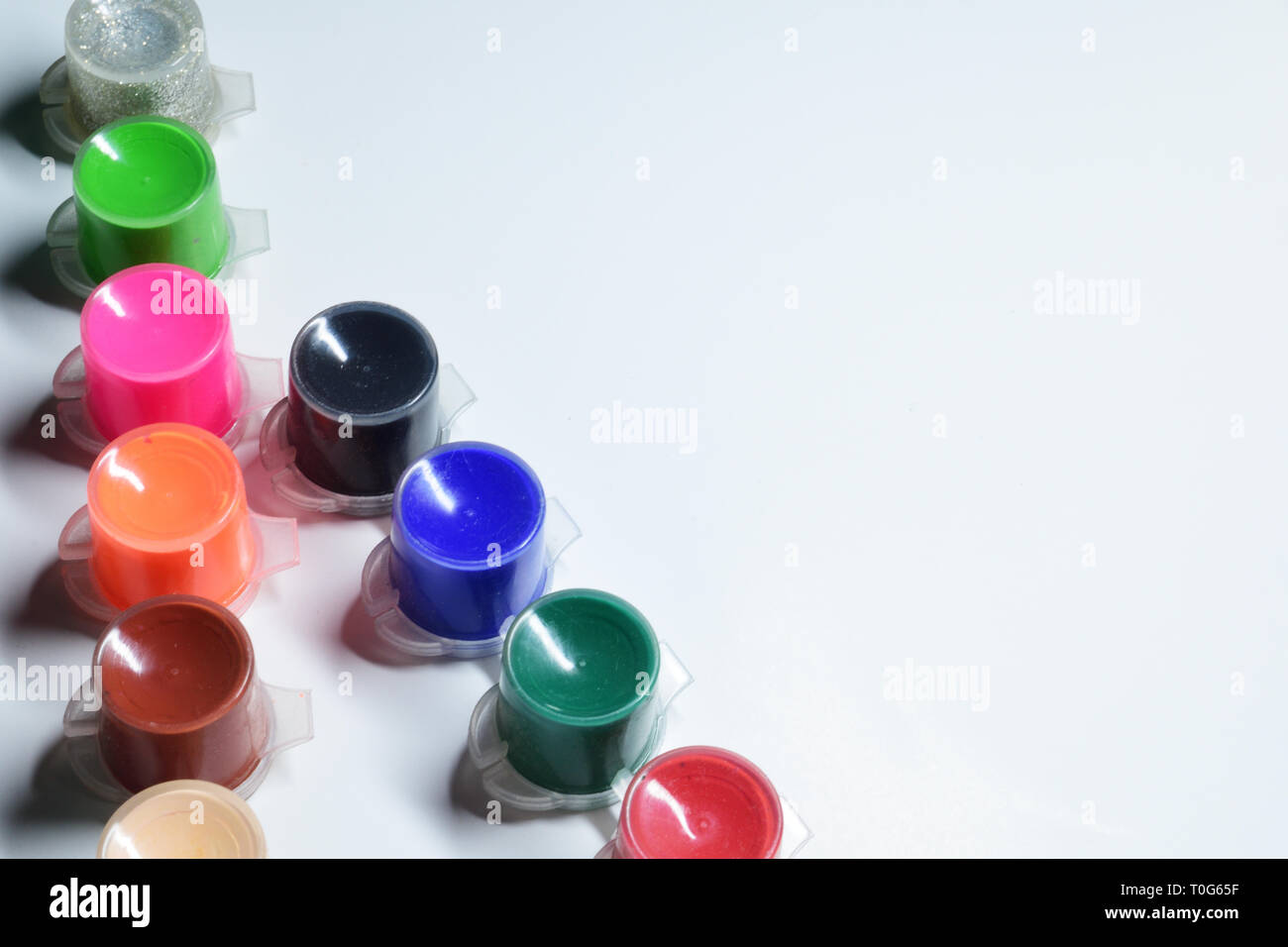 Colorful painting color tin on white background Stock Photo - Alamy