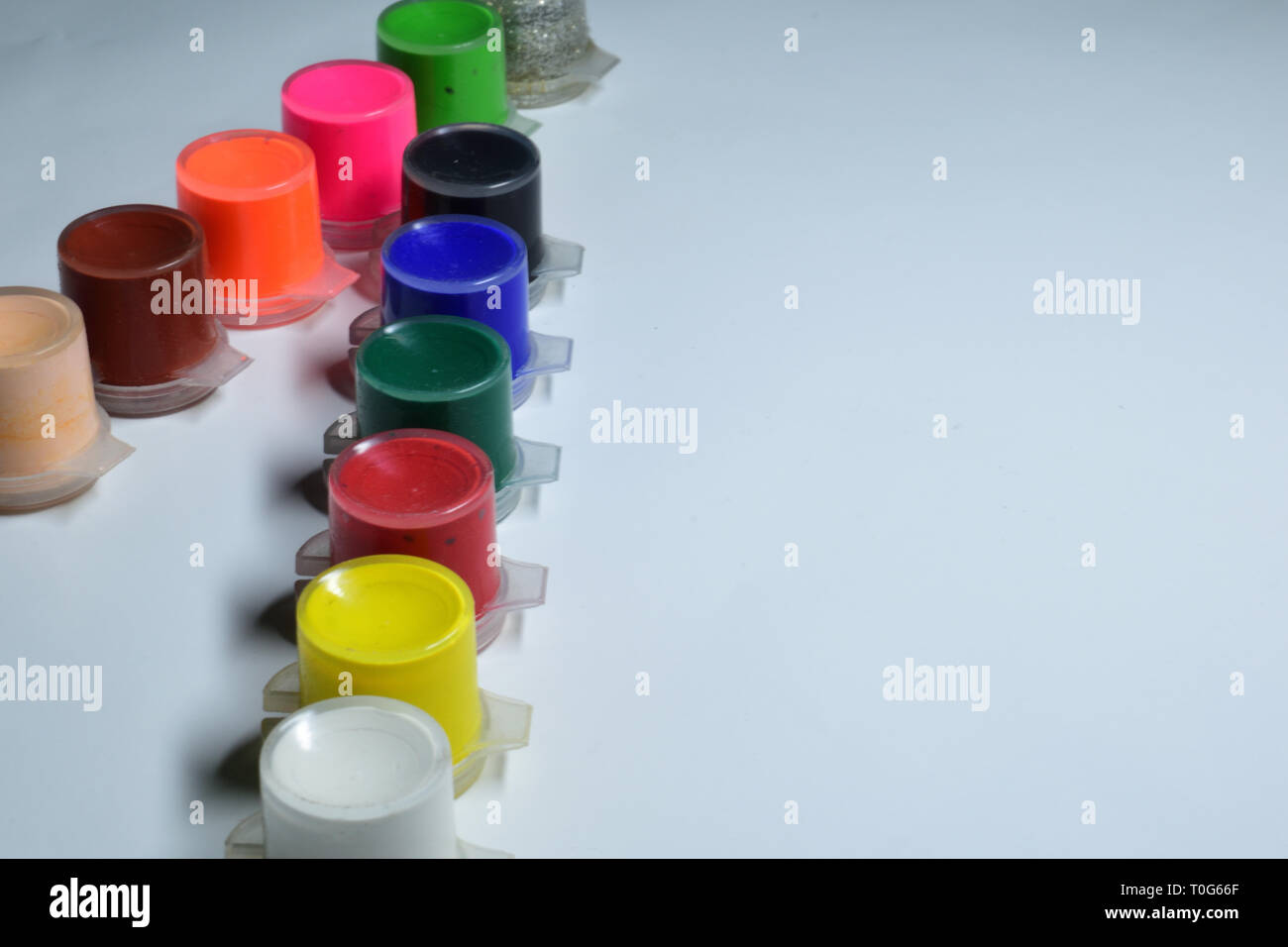 Colorful painting color tin on white background Stock Photo - Alamy