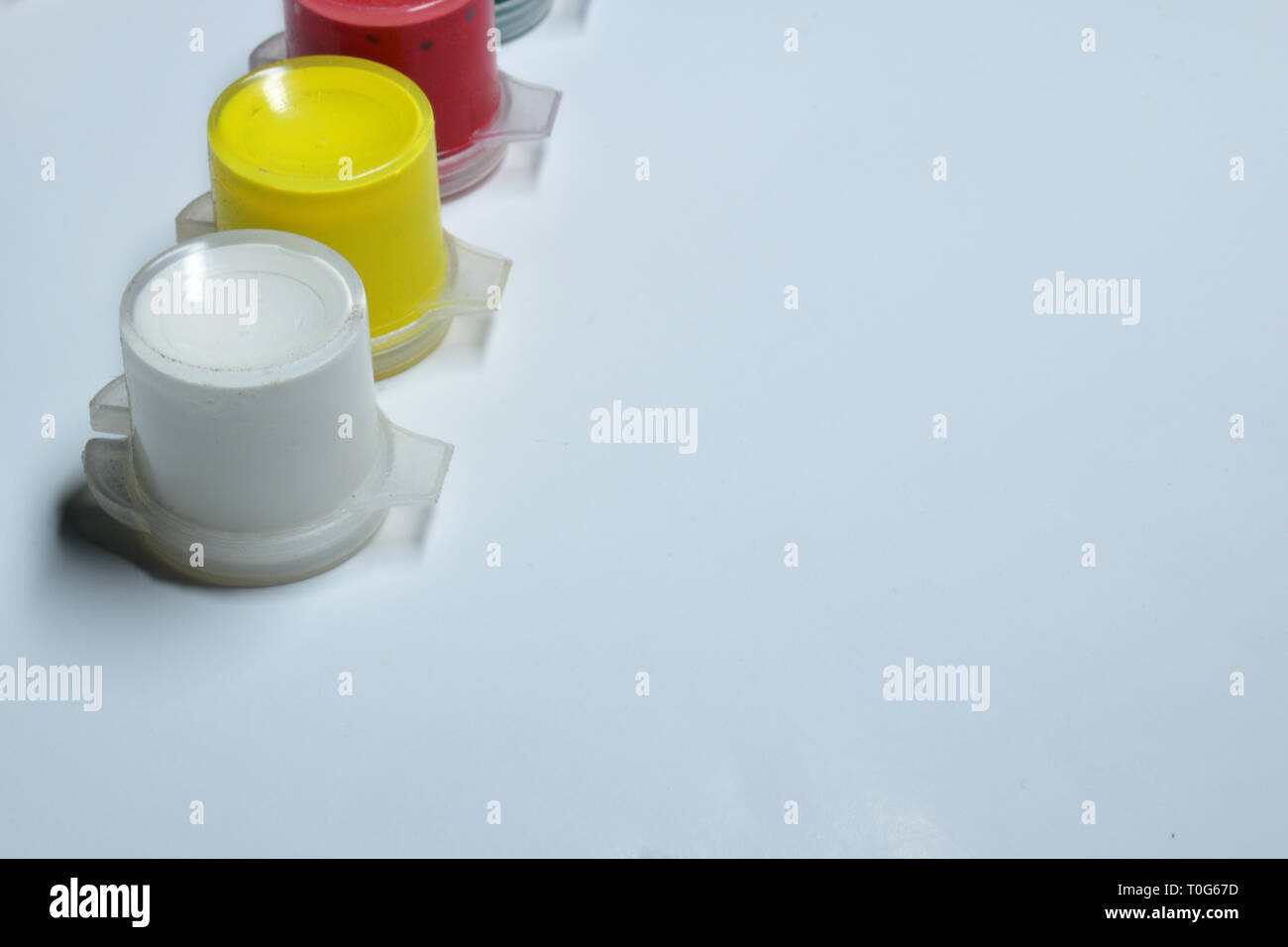 Colorful painting color tin on white background Stock Photo - Alamy