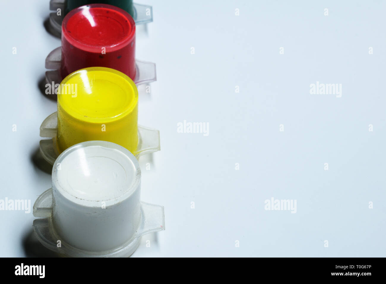 Colorful painting color tin on white background Stock Photo - Alamy