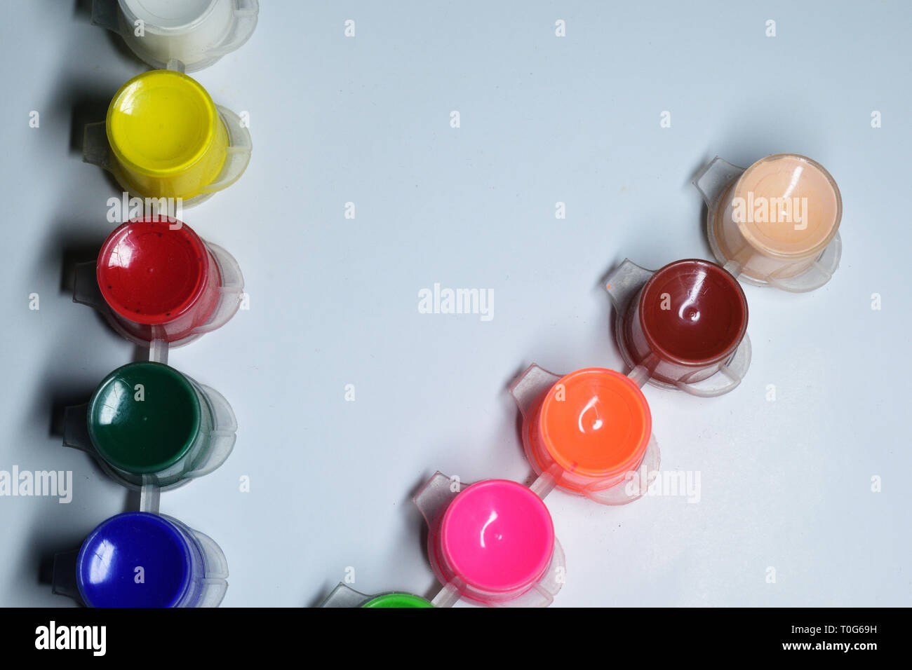 Colorful painting color tin on white background Stock Photo - Alamy