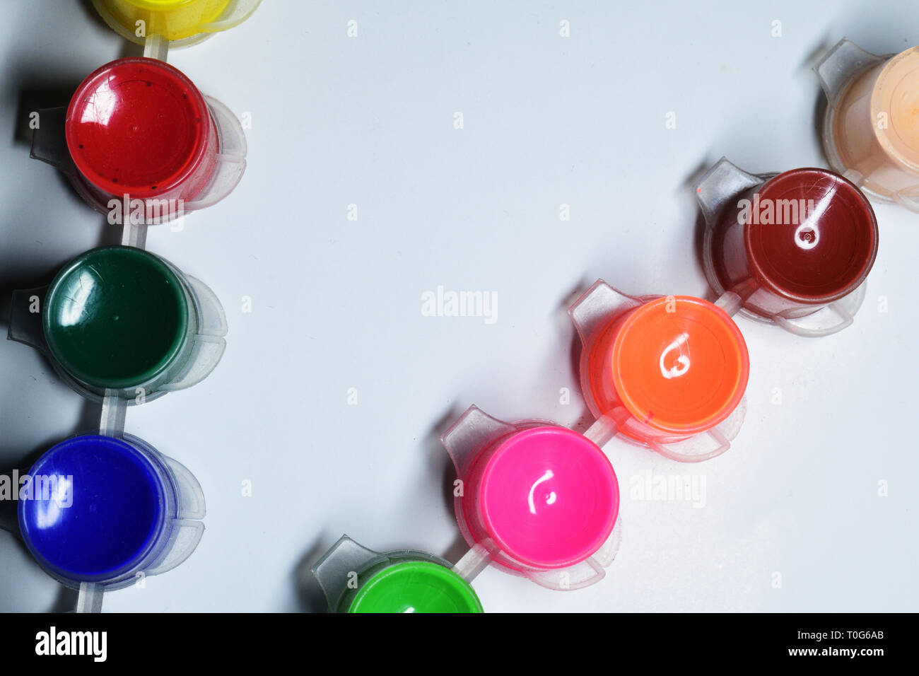 Colorful painting color tin on white background Stock Photo - Alamy