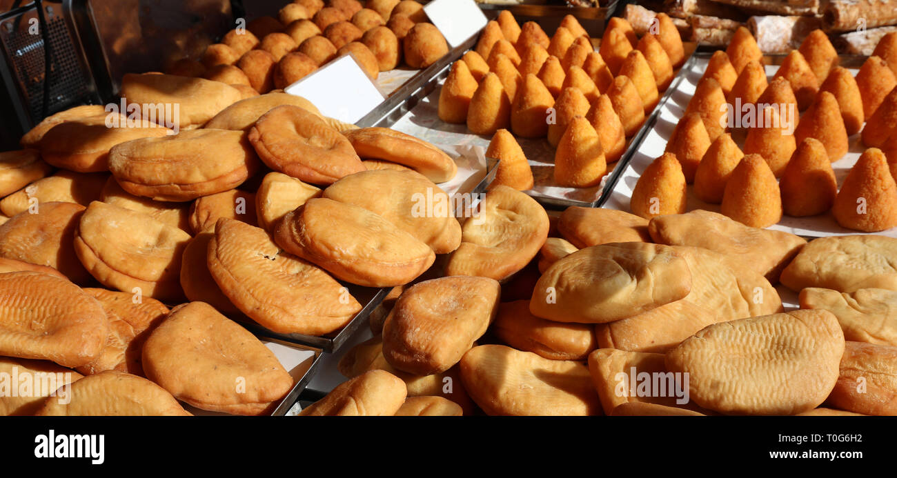 typical Italian food called Panzerotti made with tomato and mozzarella ...
