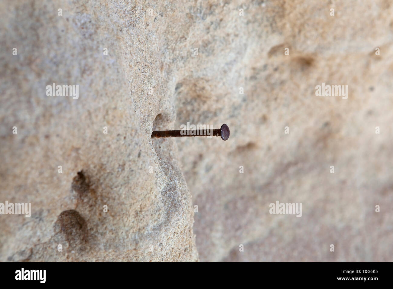 Old rock nail hi-res stock photography and images - Alamy