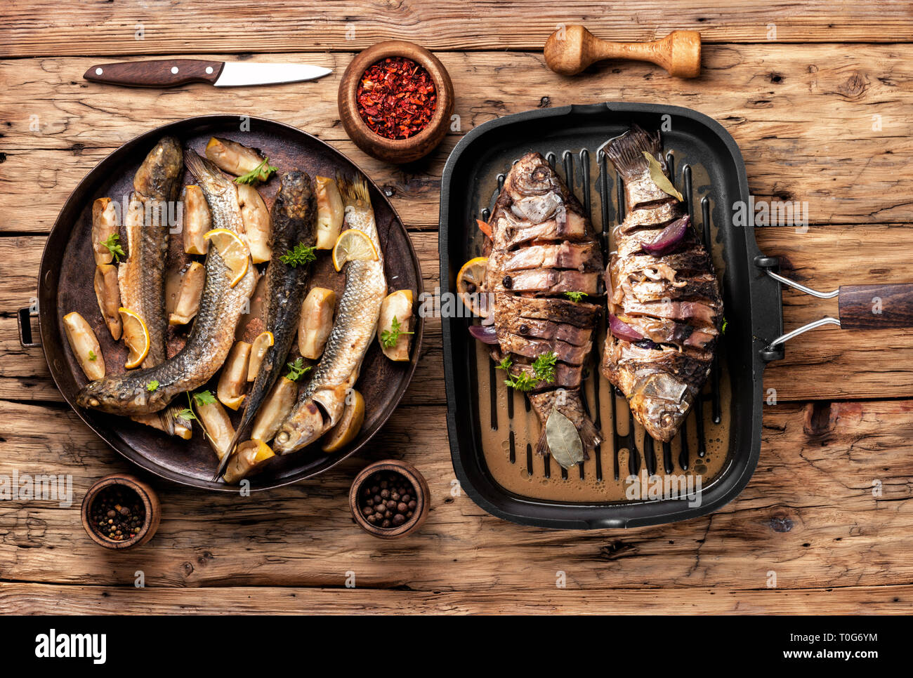 Grilled delicious fish.Baked fish with citrus,vegetable and spices in ...