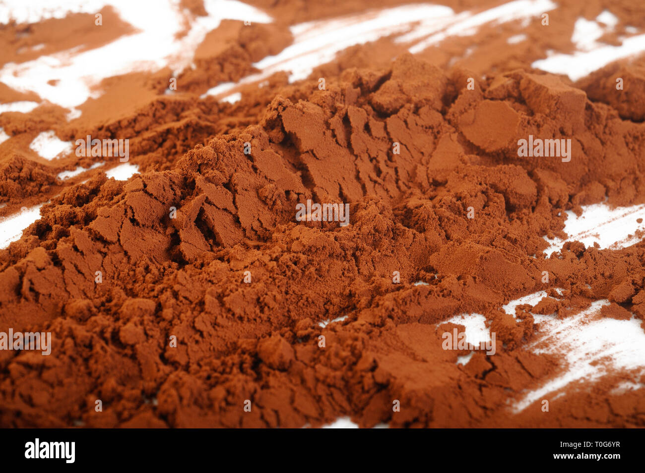 Cocoa powder background Stock Photo - Alamy