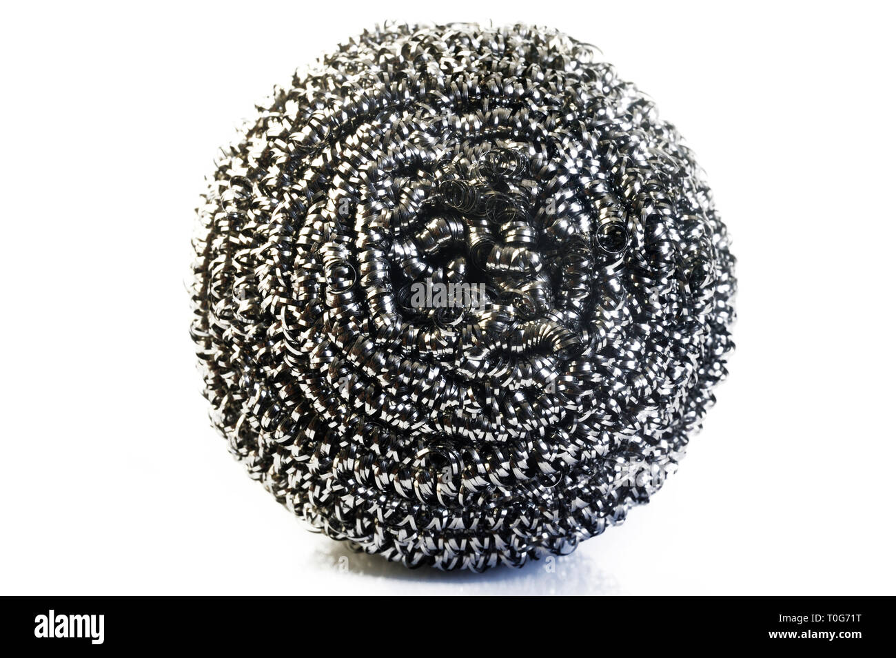 stainless steel scourer on white background Stock Photo - Alamy