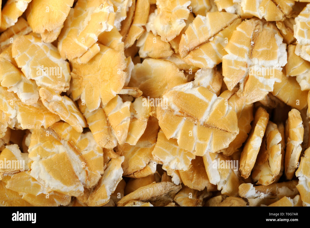 rolled wheat background Stock Photo - Alamy