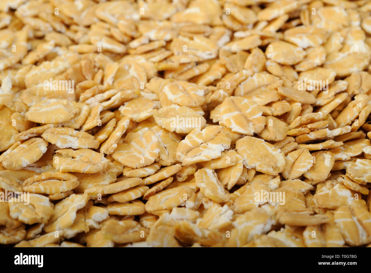 rolled wheat background Stock Photo - Alamy