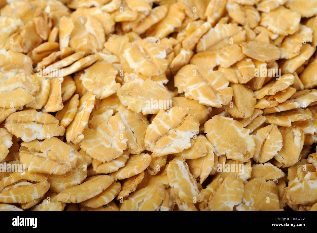 rolled wheat background Stock Photo - Alamy