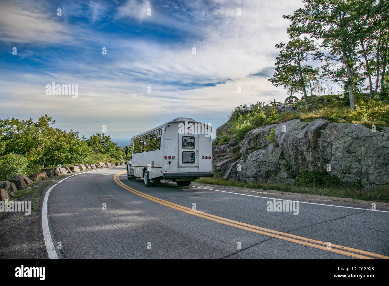 Shuttle bus on its way between mountain top and base Stock Photo - Alamy