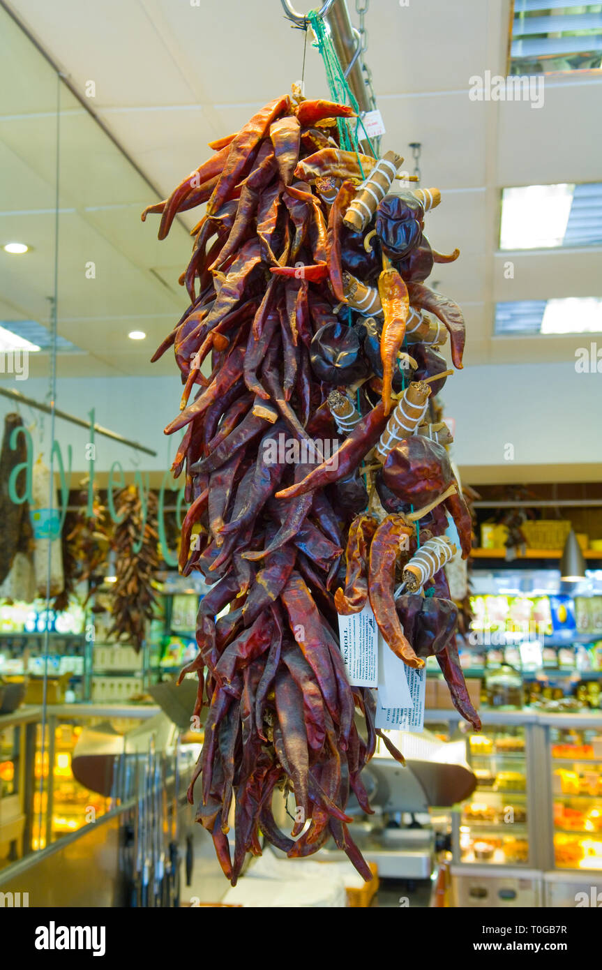 A display of dried chillies in a local deli Stock Photo - Alamy