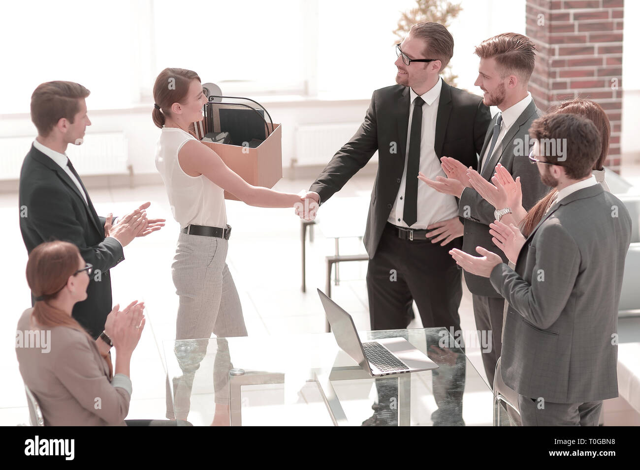 boss and the new employee shaking hands with each other Stock Photo - Alamy