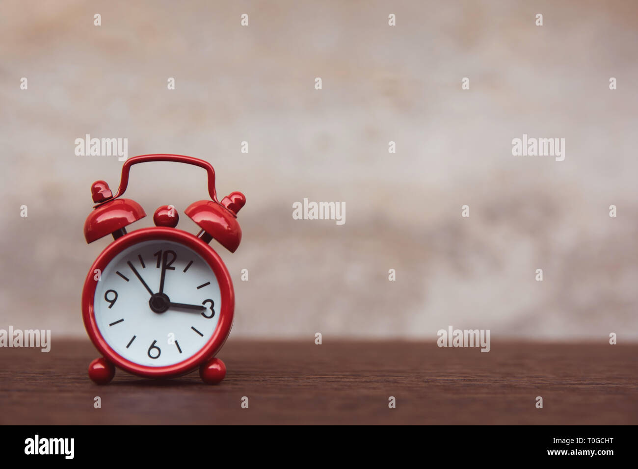 Alarm clock shows one o`clock isolated on white background Stock Photo ...