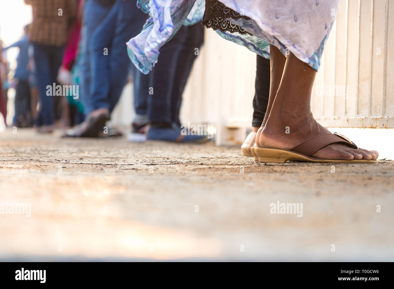 Crowd of people standing wearing sandals in Colombo, Sri Lanka Stock ...