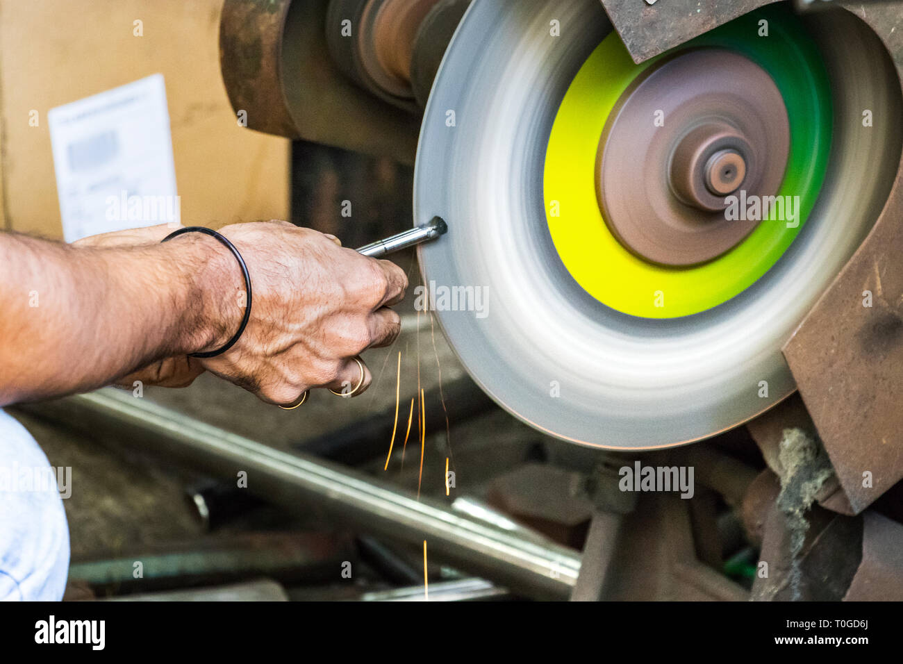 Man using grinding machine hi-res stock photography and images - Alamy