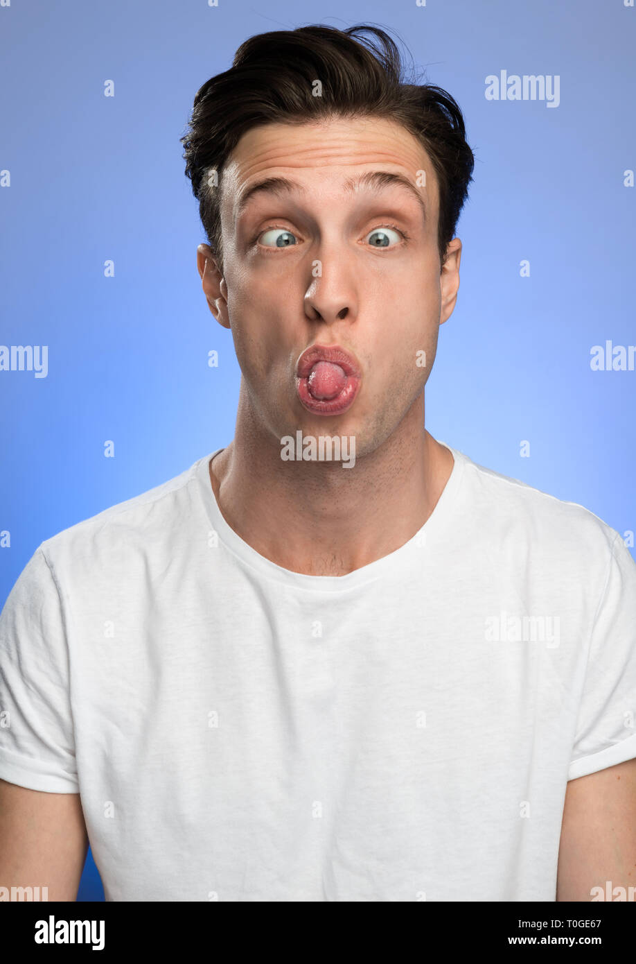 portrait series of a young white man with different facial expressions ...