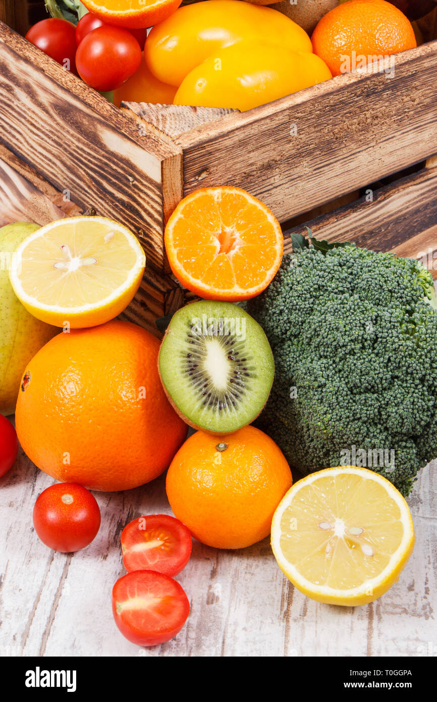 Fresh ripe natural fruits with vegetables in rustic box as food ...