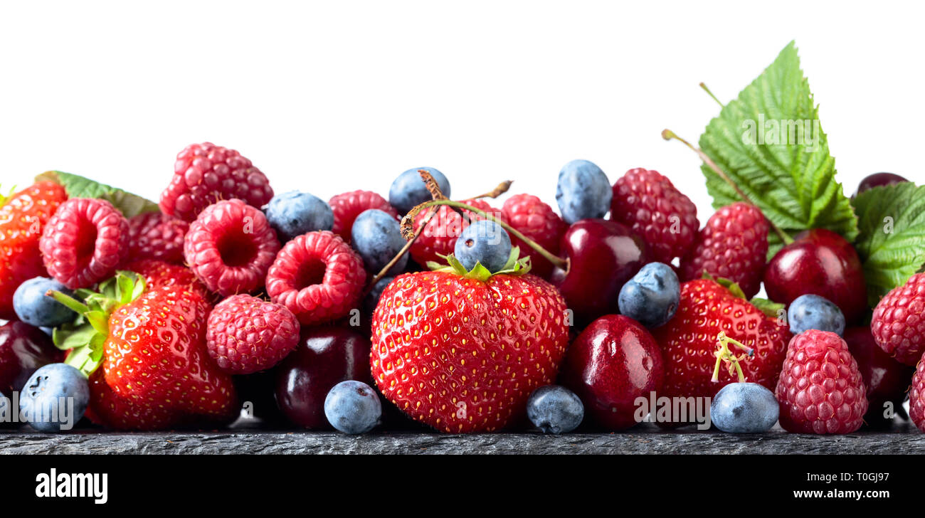 Strawberry, blueberry, raspberry and sweet cherry isolated on a white ...