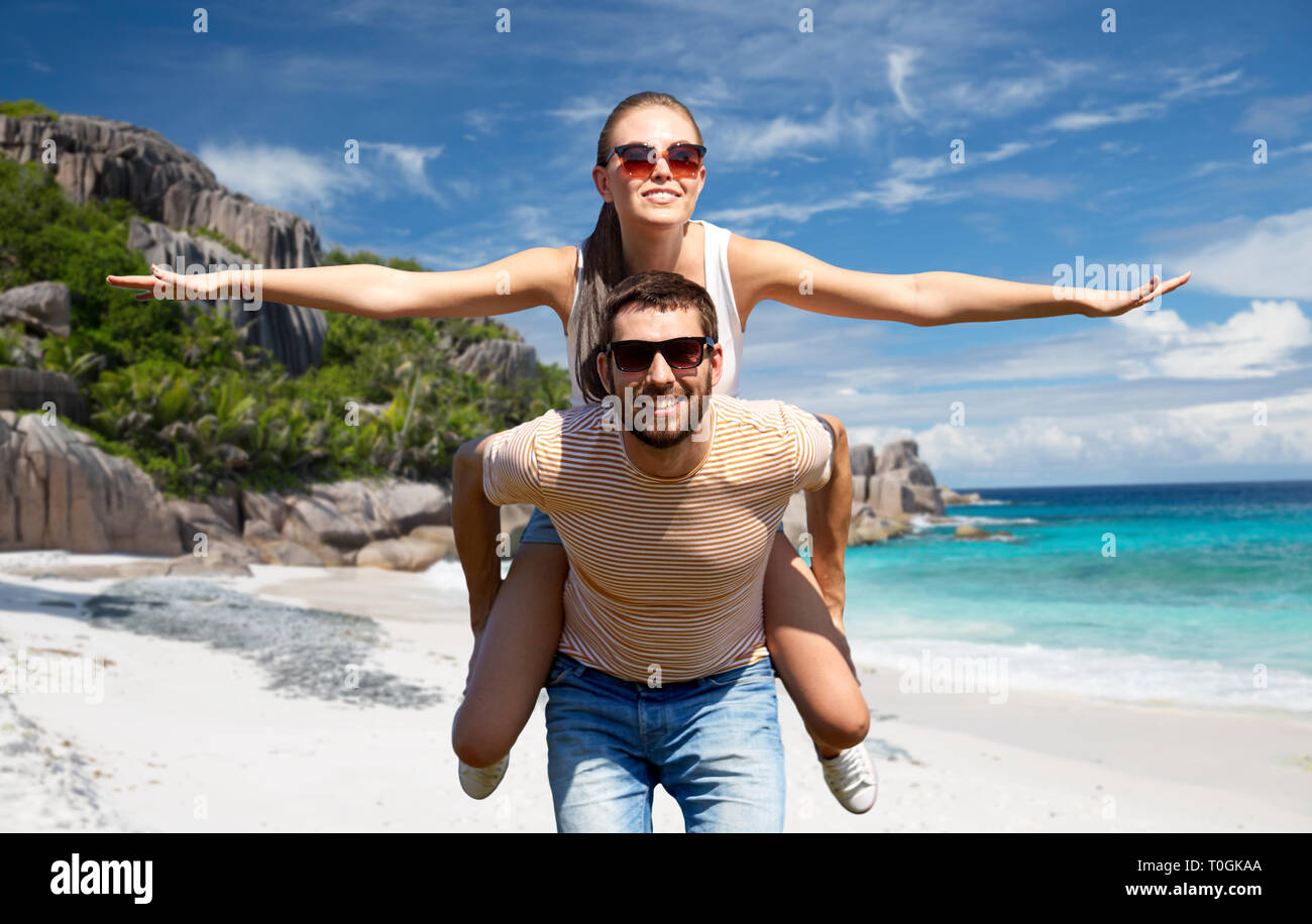 Couple having fun together on the beach hi-res stock photography and ...