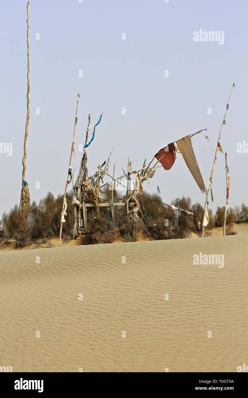 Votive flags-burial mound-Imam Asim's mazar or mausoleum area ...