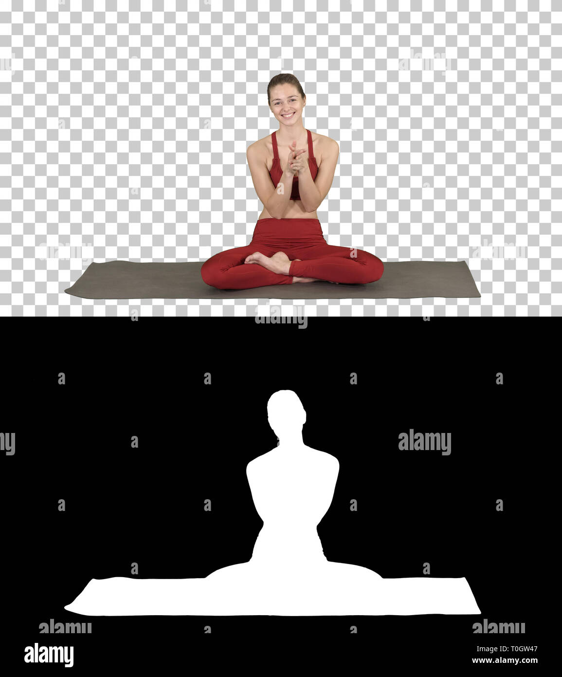 Positive cheerful young female in yoga pose clapping hands and smiling ...