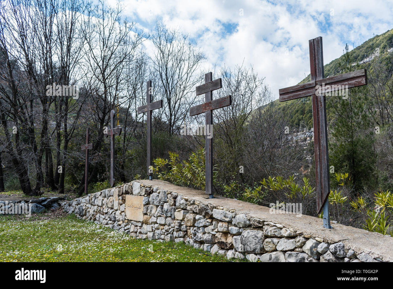 this is a capture for a multiple christian crosses which sit on a wall ...