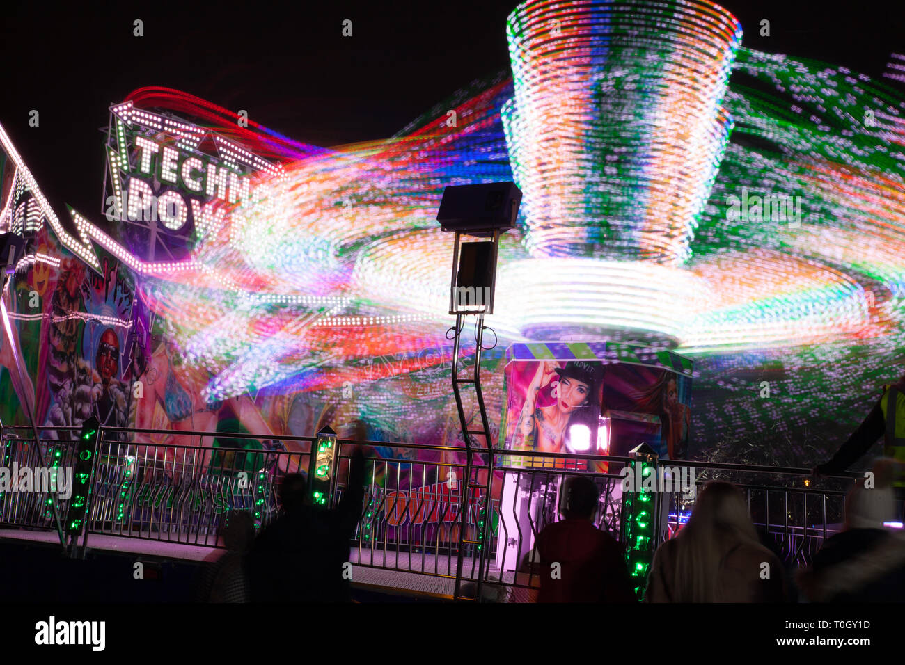 A colorful fairground ride with a long exposure glasgow Stock Photo - Alamy