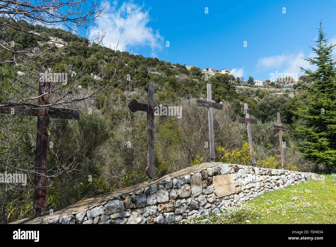 this is a capture for a multiple christian crosses which sit on a wall ...